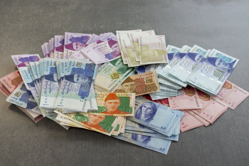 A Pile of Different Value of Pakistan New Currency Notes Stock Photo ...