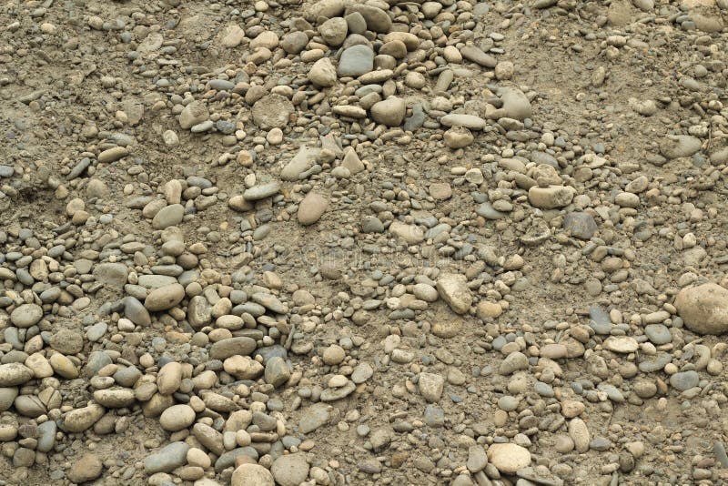 A Pile of Dirty Stones Background Stock Image - Image of pebbles ...