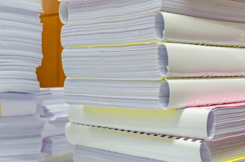 Pile of Documents on Desk Stack Up High Waiting To Be Managed Stock ...