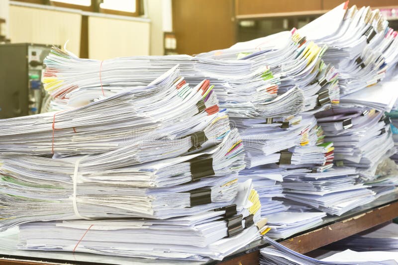 Pile of Documents on Desk Stack Stock Photo - Image of cost, collection ...