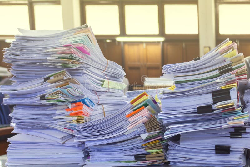 Pile of documents on desk stock photo. Image of financial - 82346020