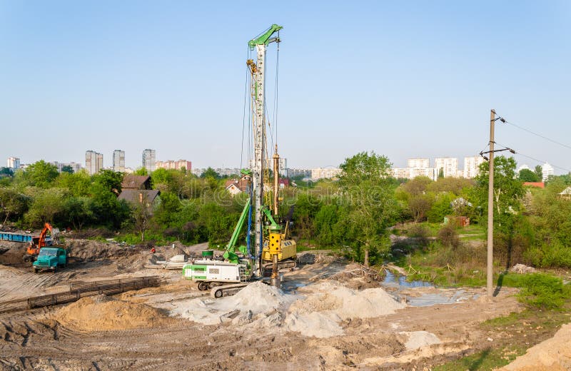 Pile Driver at a Construction Site Stock Photo - Image of driver ...