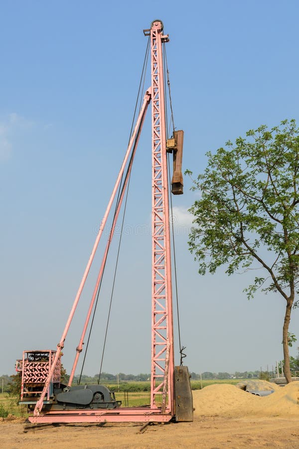 Pile driver machine stock image. Image of pink, materials - 57103321