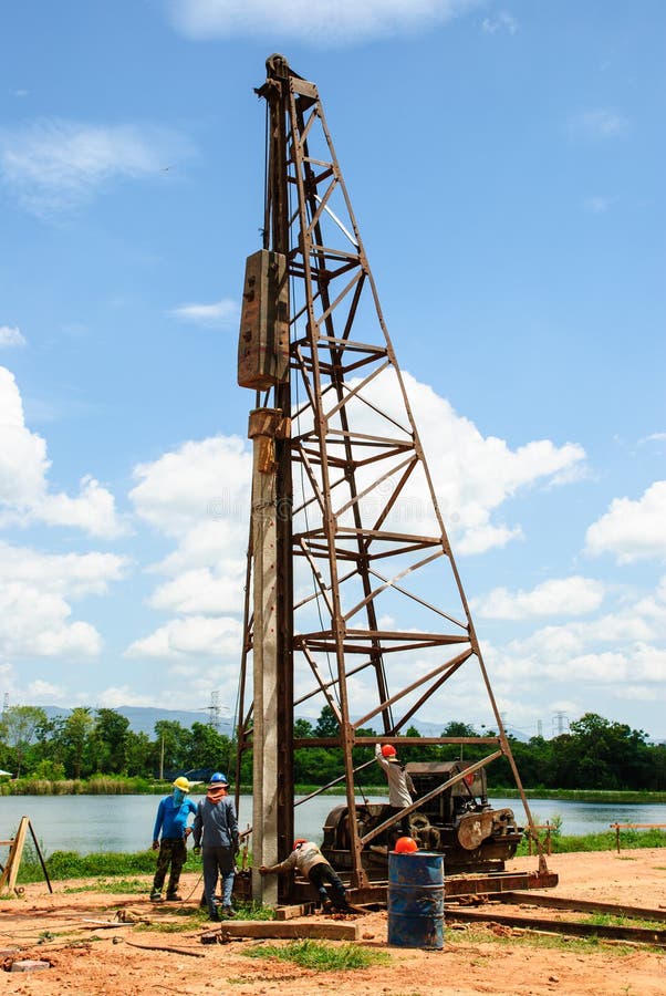 Construction Workers And Pile Driver Stock Image - Image of driver ...
