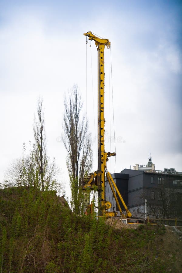 Pile Driving Machine at Construction Site. Vertical Shot Stock Image ...