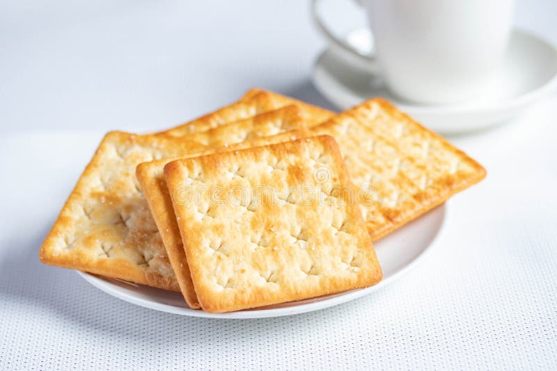 A Pile of Dry, Thin Crackers in a Cup. Natural Light Stock Image ...