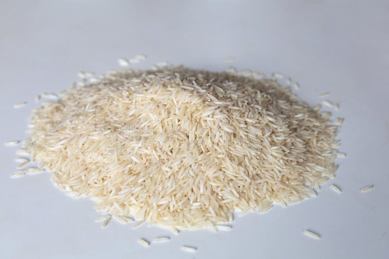 A pile of dry white rice stock image. Image of grain - 367855533