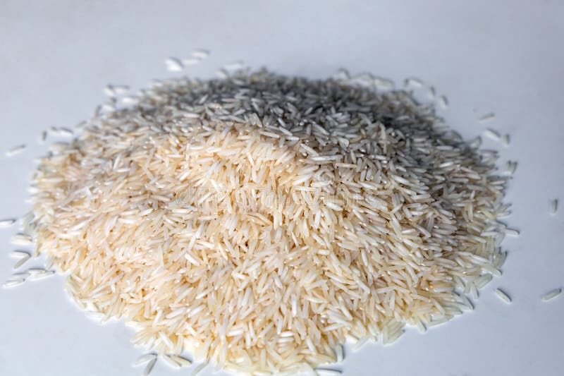 A pile of dry white rice stock image. Image of healthy - 369711257