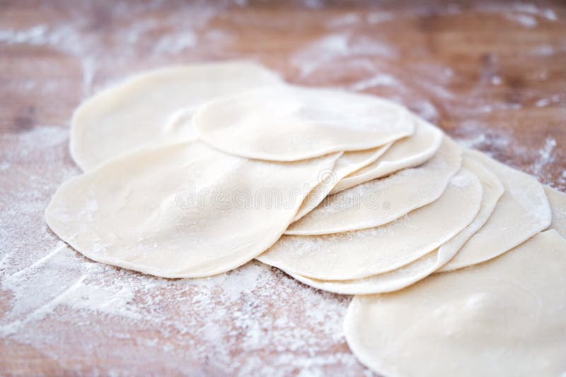 A pile of dumpling skin stock image. Image of flour - 229959043