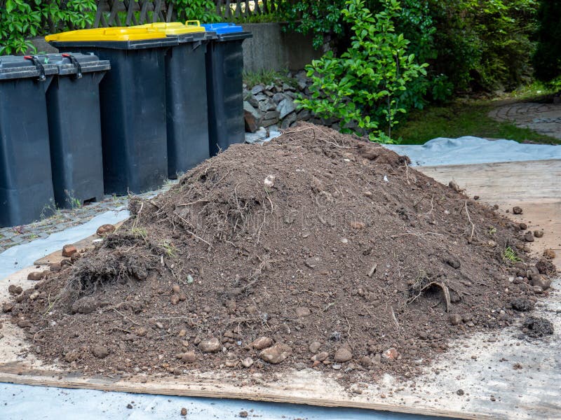 Pile of Earth for a Garden Bed Stock Photo - Image of center, green ...