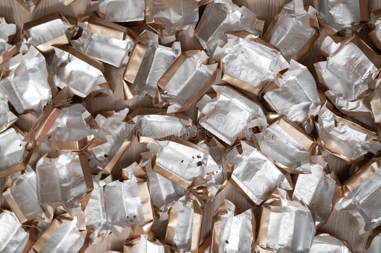 Pile of Empty Silver-gold Candy Wrappers. Top View. Stock Image - Image ...