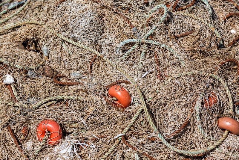 Pile of red fishing nets stock photo. Image of nets - 111242448