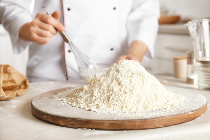 Pile of Flour on Black Table, Top View Stock Image - Image of food ...
