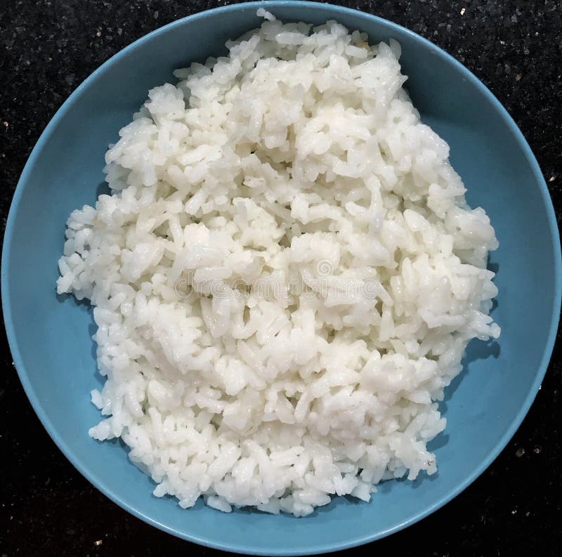 A Pile of Fluffy White Rice in a Blue Plate Stock Image - Image of ...