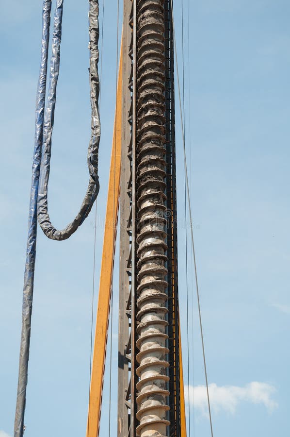 Pile Foundation of a Frame House. Steel Piles Screwed into the Ground ...