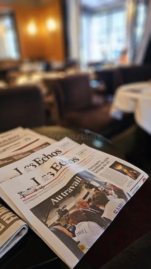 A Pile of French Newspapers on a Table in a Restaurant Editorial Photo ...
