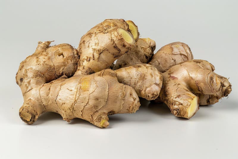 A Pile of Fresh Gingers on a White Surface Stock Photo - Image of ...