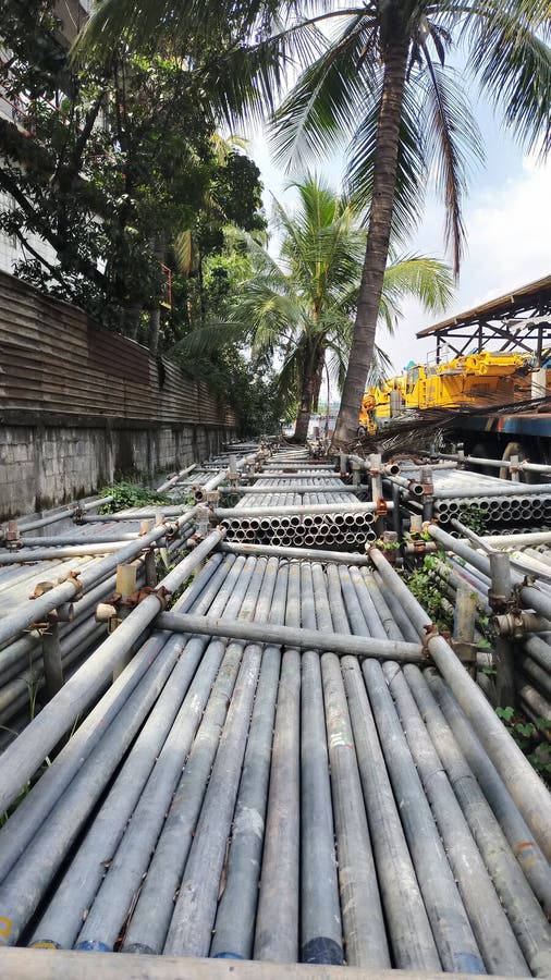 Pile of Galvanized Pipe Under the Coconut Tree Stock Photo - Image of ...