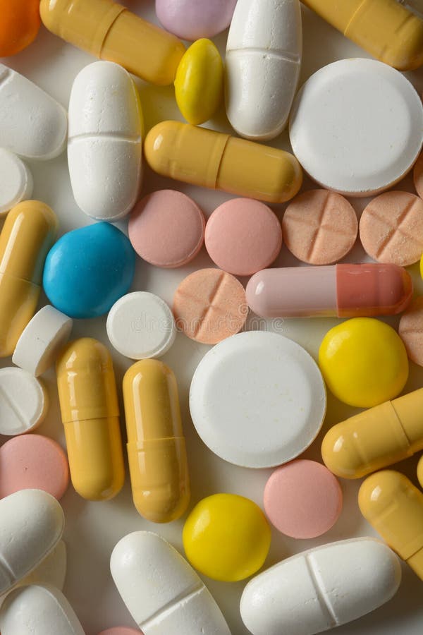 Pile of Generic Drugs on White Table Stock Image - Image of closeup ...