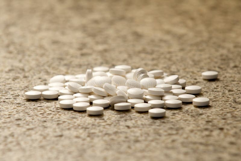 Pile of Generic White Pills on Hard Surface Stock Image - Image of ...