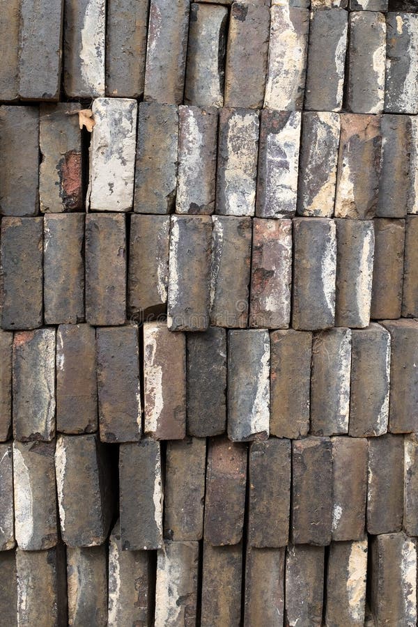 A Pile of Gray Bricks Ready for Use, Looking at the Long Edge of the ...