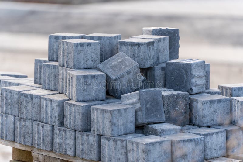 A pile of gray bricks stock image. Image of texture - 374328711
