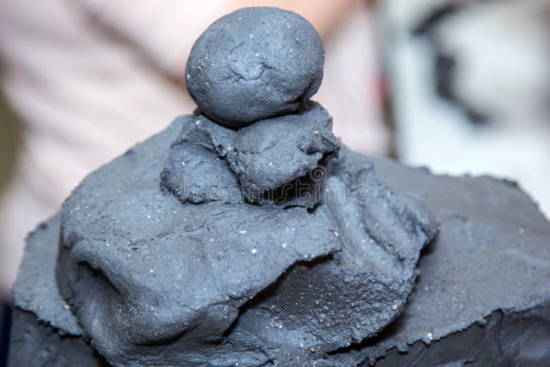 Pile of gray modeling clay stock photo. Image of potter - 164251108