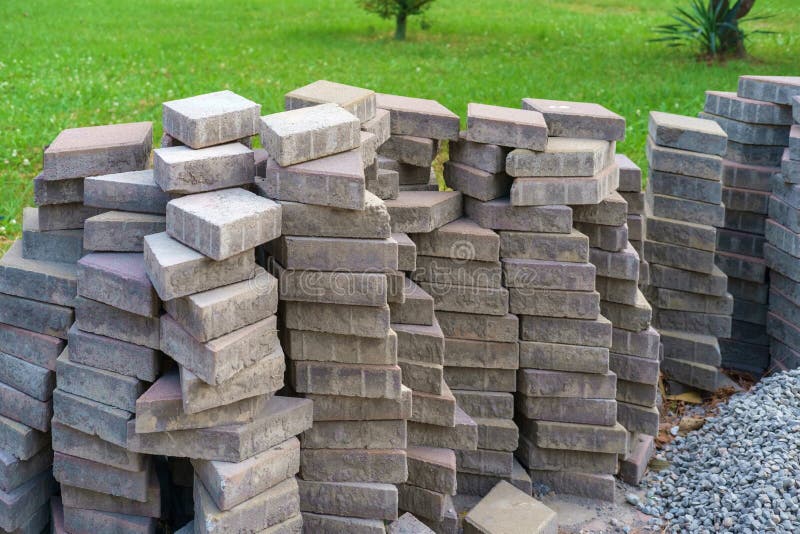 A Pile of Gray Paving Tiles on the Meadow Stock Photo - Image of pack ...