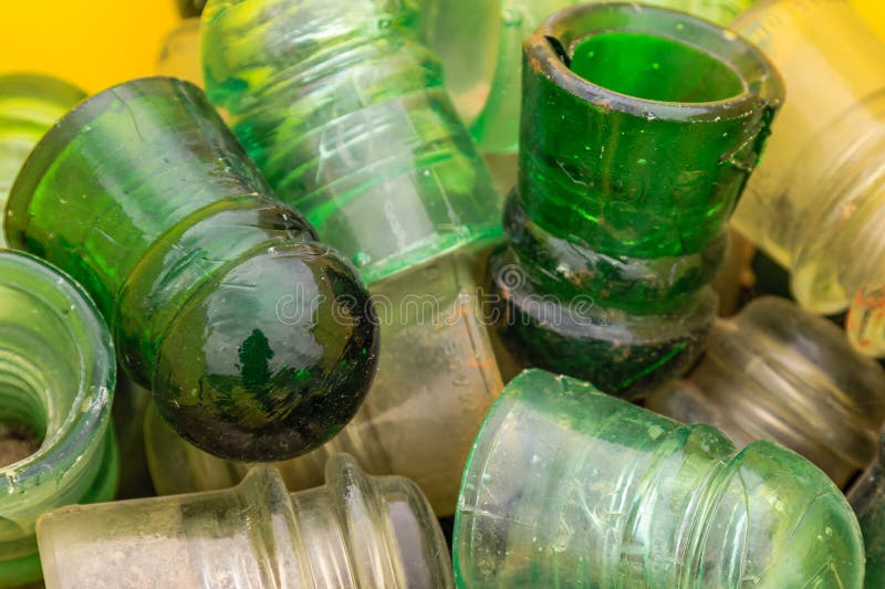 A Pile of Green and White Glass Jars Stock Photo - Image of bottles ...