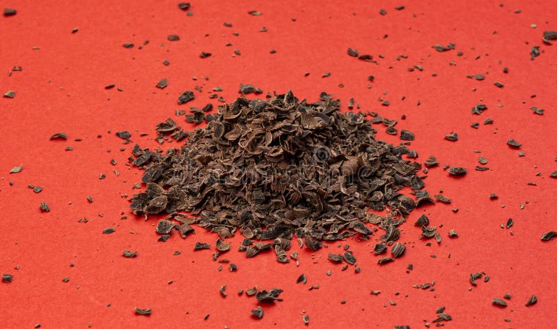 Pile of Ground Chocolate on Red Background Stock Photo - Image of cake ...