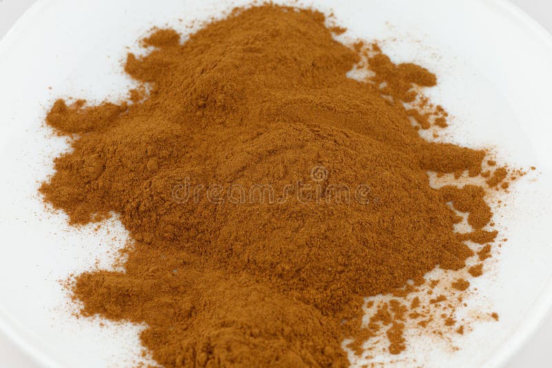 Pile of Ground Cinnamon on White Background Stock Image - Image of ...