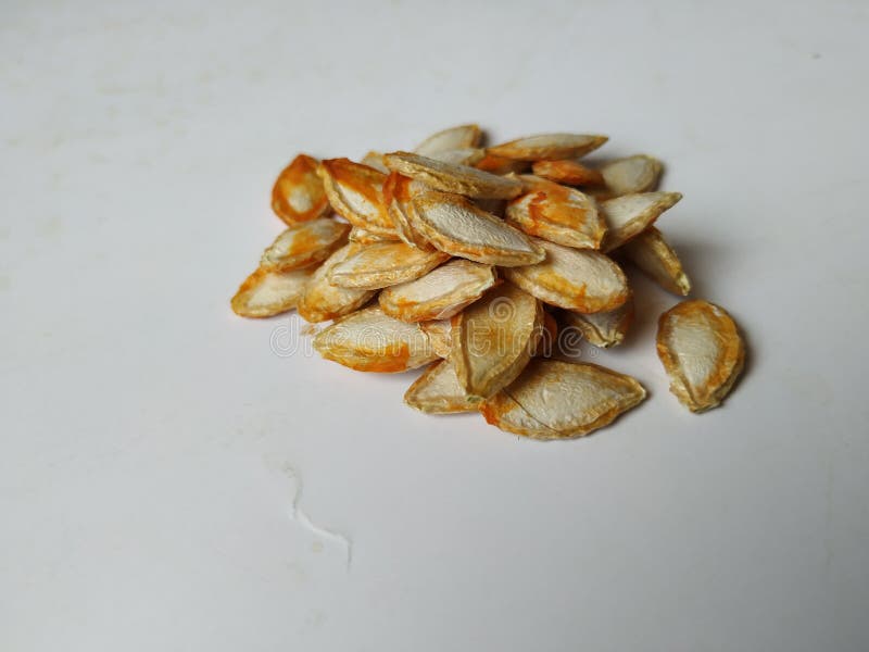 Pile and Heap of Dry Pumpkin Seeds Isolated on White Background ...