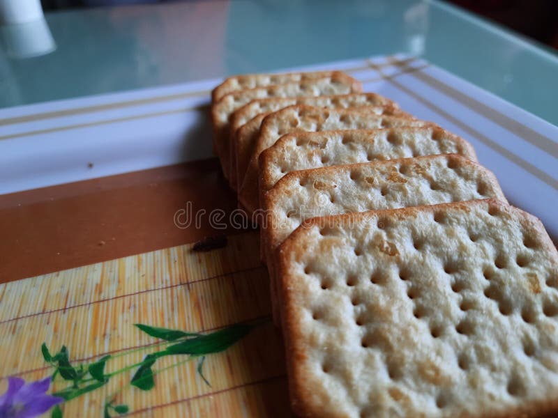 Pile and Heap of a Rectangle Shape Salt Biscuit in a Serving Plate ...