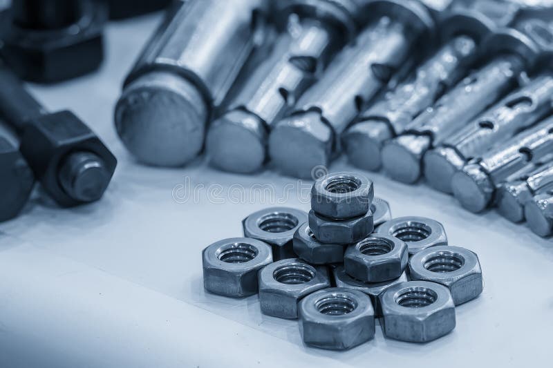 The Pile of Hexagon Nut Parts in the Light Blue Scene Stock Image ...