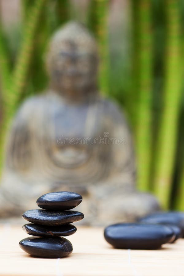 Pile of stones at sunrise stock photo. Image of ocean - 26182924
