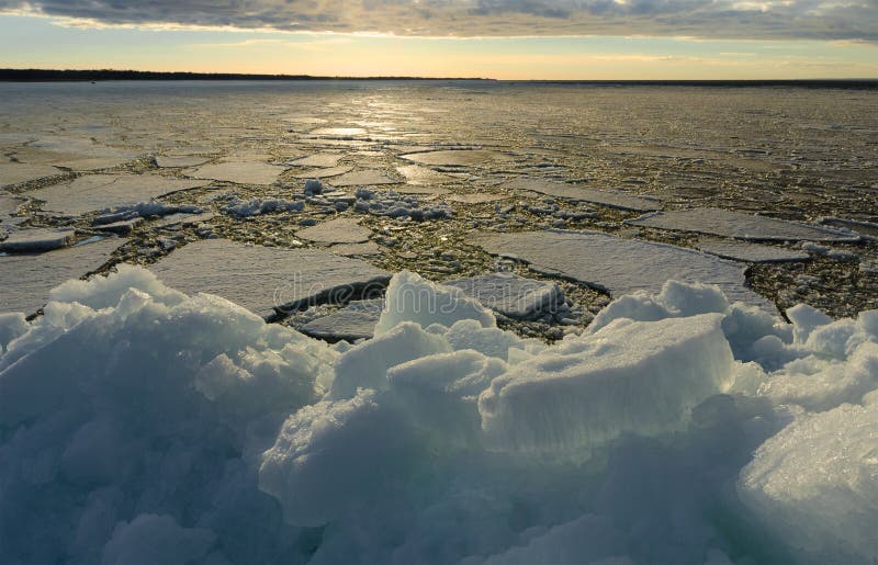 Pile of Ice on the Beach in Sunset Stock Photo - Image of blue ...