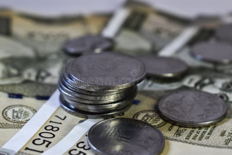 Pile of Indian 500 Rupees Currency Notes and Coins. Selective Focus ...