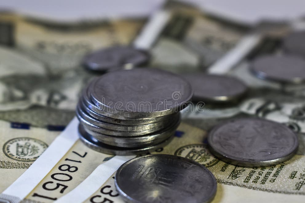 Pile of Indian 500 Rupees Currency Notes and Coins. Selective Focus ...