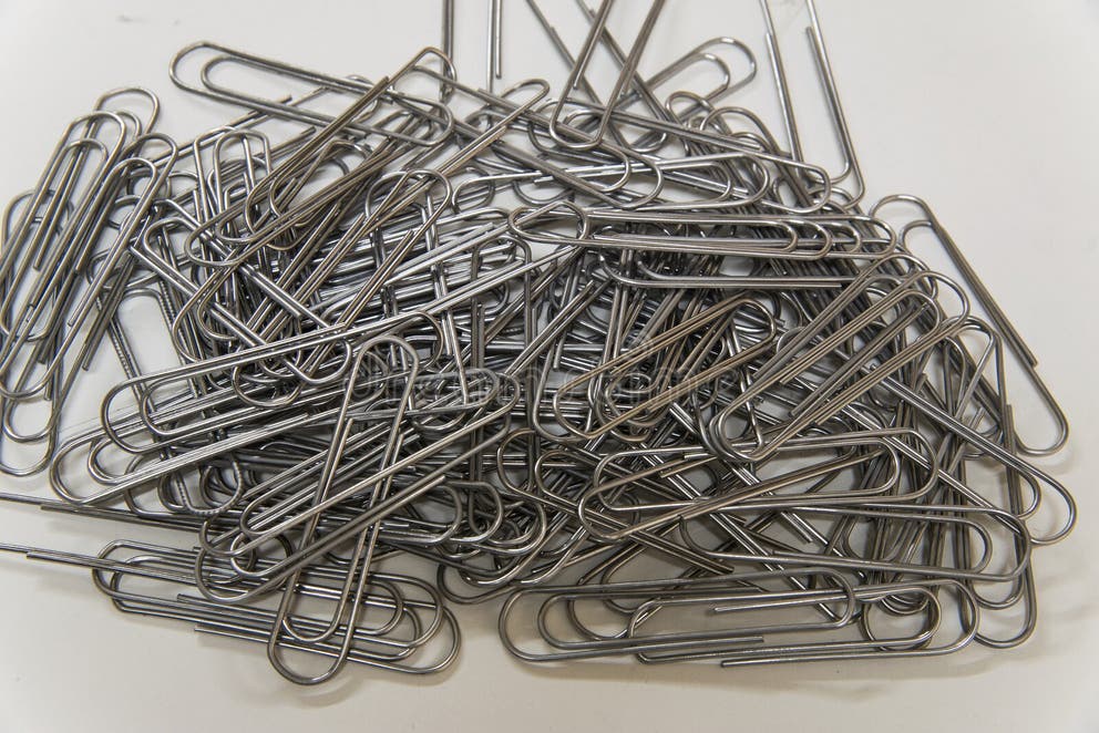 Pile of Iron Paperclips stock image. Image of office - 82763411