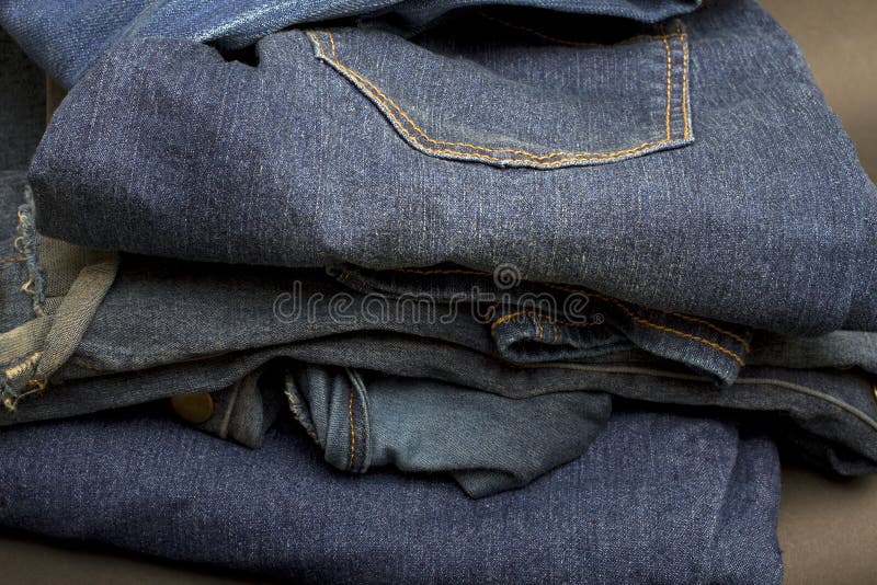 Pile of Jeans stock image. Image of pants, denim, wrinkled - 25724365