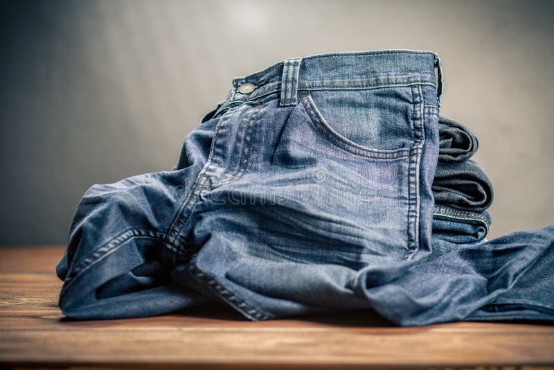 Pile of jeans stock photo. Image of pile, fashion, design - 85214292