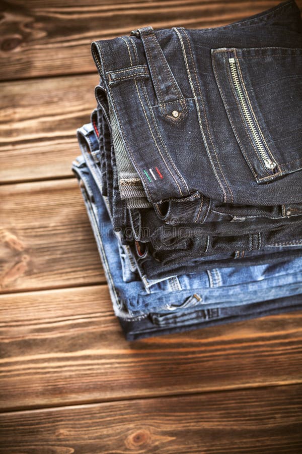 Pile of jeans stock photo. Image of outfit, color, style - 85187780