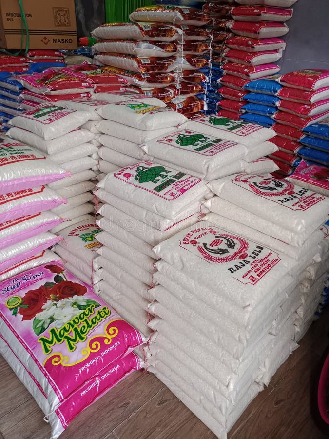 Pile of 25 Kg and 5 Kg Rice, on the Market. Editorial Photo - Image of ...