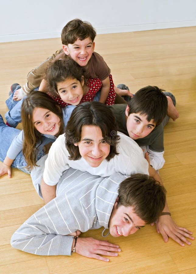Pile of kids stock image. Image of adolescent, child, lying - 7014809