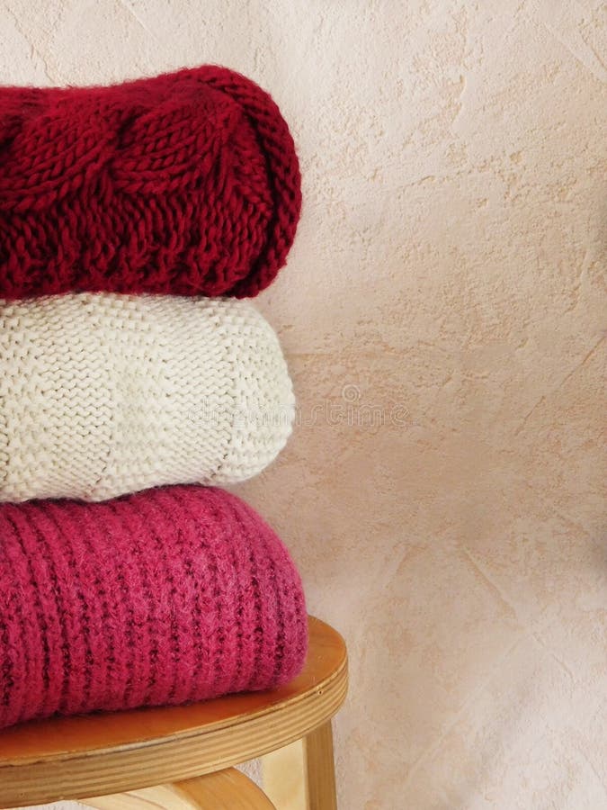 A pile of knitted sweaters stock photo. Image of heap - 101771720