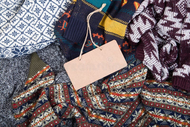 Pile of Knitted Winter Sweaters on Wooden Background Stock Image ...