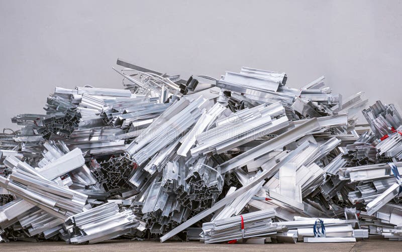 Pile of Many Aluminum Waste Construction Material Scraps on the Ground ...