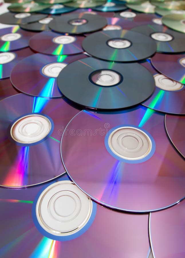 Pile of Many CDs or DVDs stock photo. Image of backgrounds - 2134864