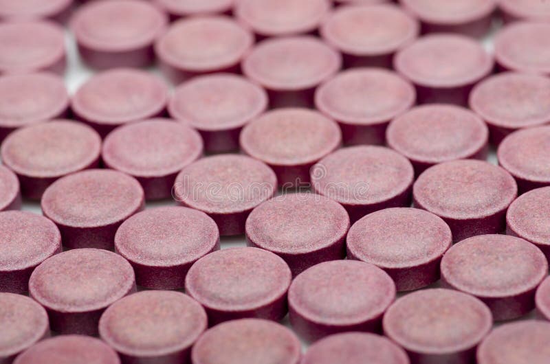 Pile of Many Small Red Pills, Group of Vitamins. Red Pills on a Stock ...