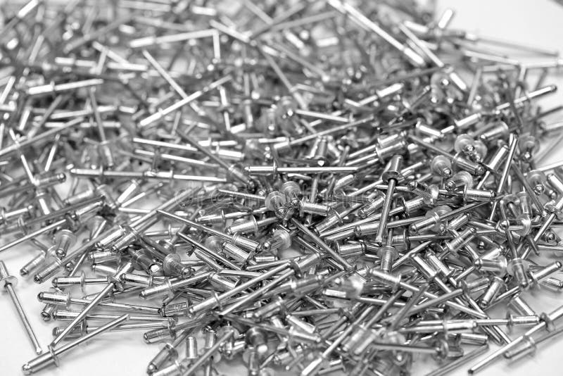 Pile of metal rivets stock image. Image of background - 130968559